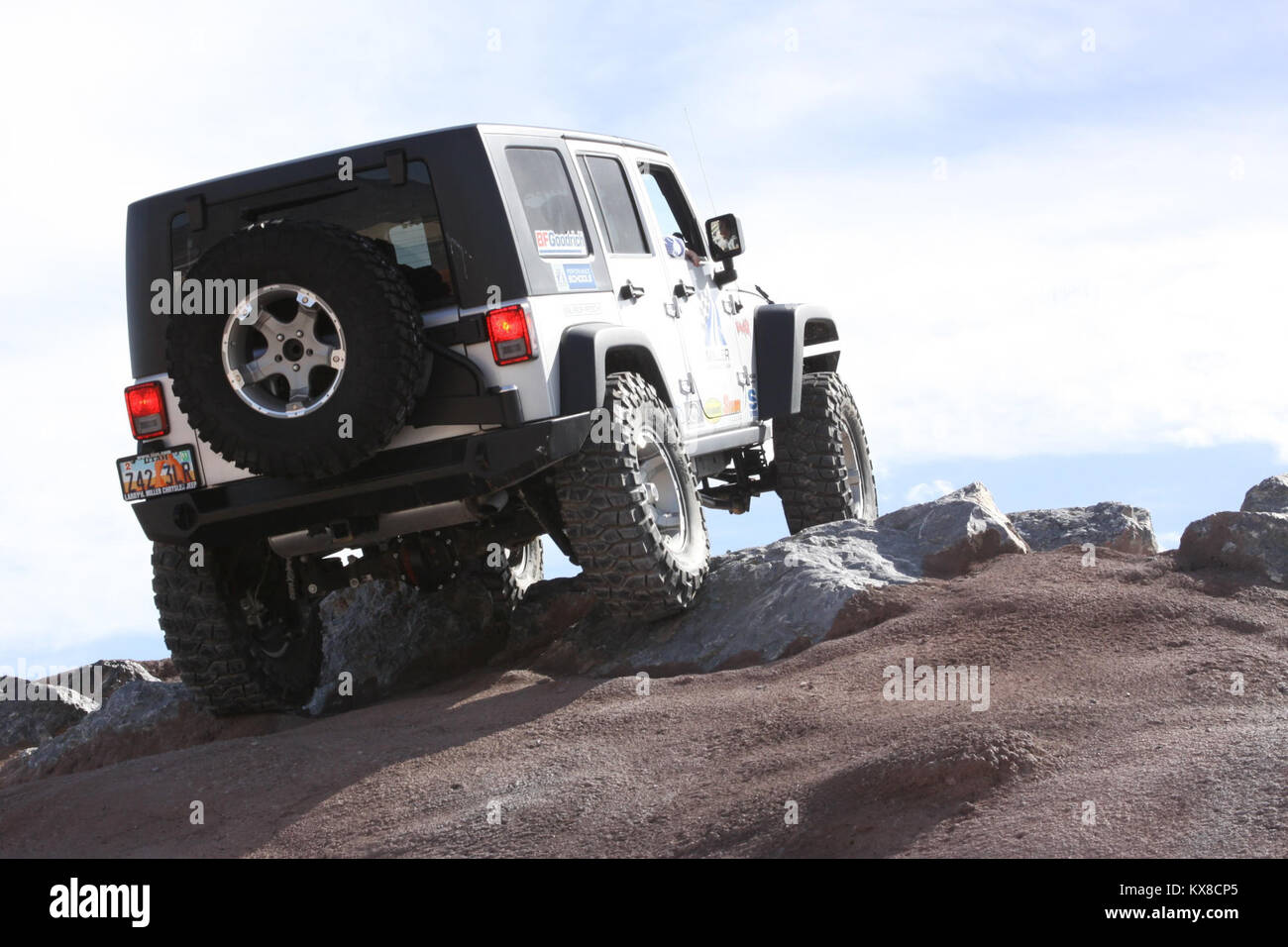 US Army National Guard off road driving in civilian Jeep Stock Photo ...