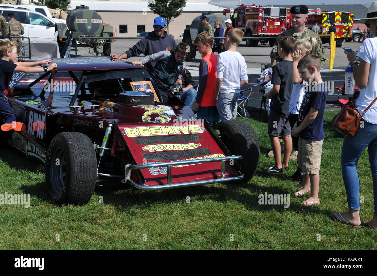 US Army National Guard meet with vintage muscle car enthusiasts Stock ...