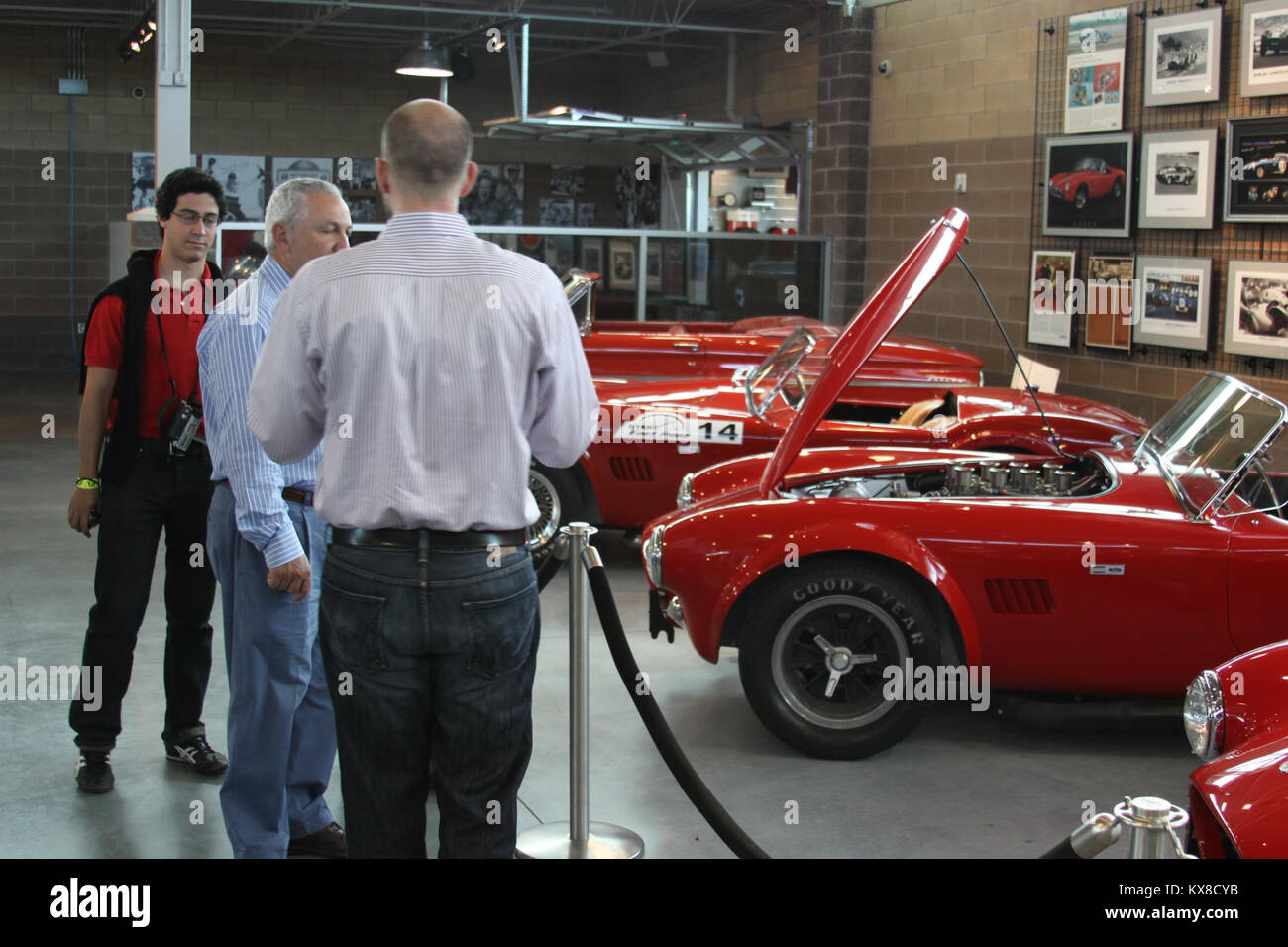 US Army National Guard meet with vintage muscle car enthusiasts Stock ...