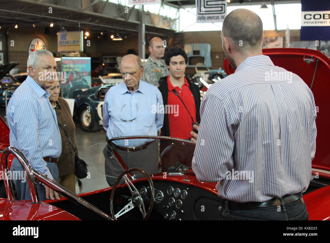 US Army National Guard meet with vintage muscle car enthusiasts Stock ...