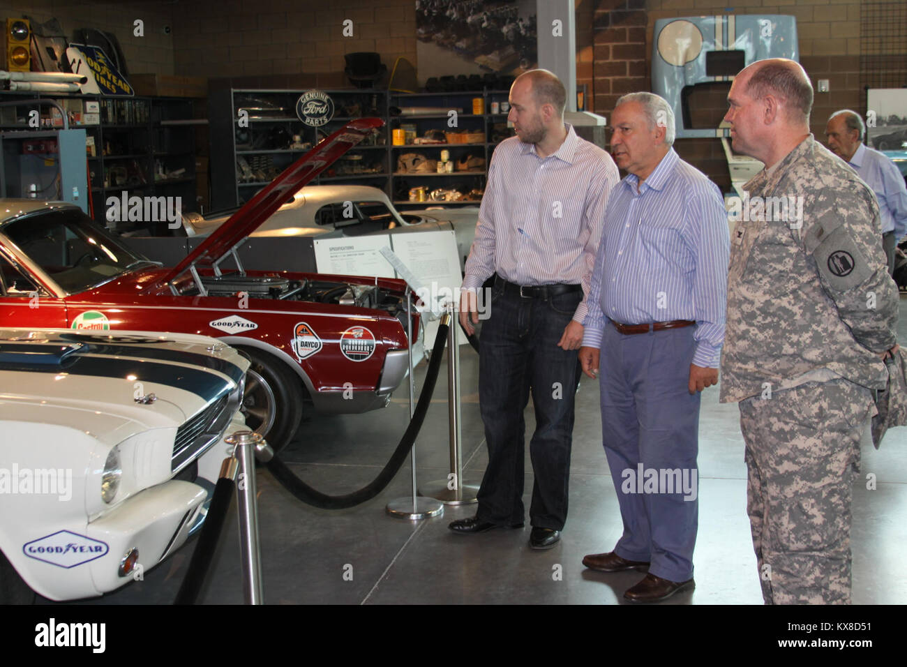 US Army National Guard meet with vintage muscle car enthusiasts Stock ...