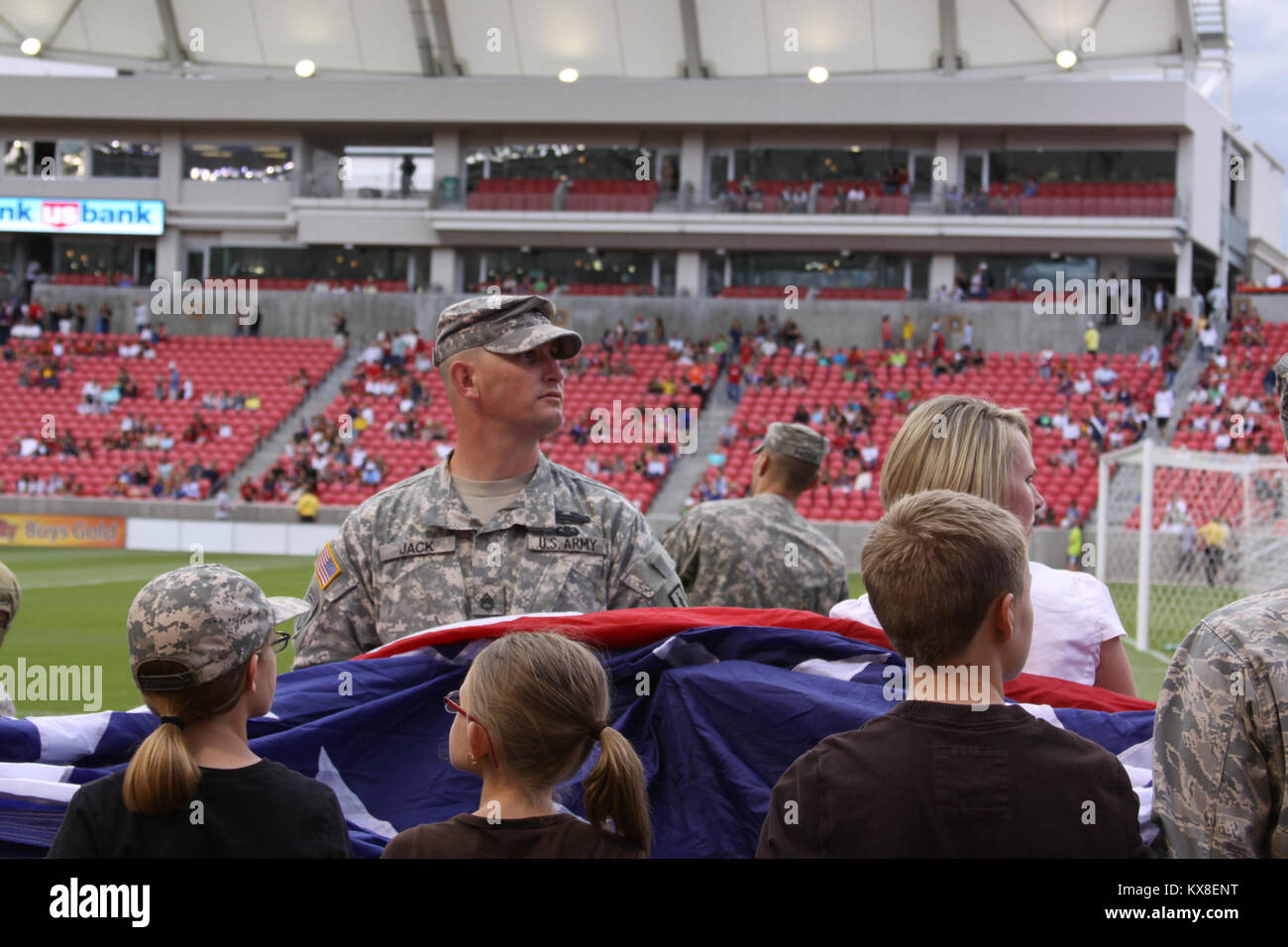 US military with families at sports stadium Stock Photo - Alamy
