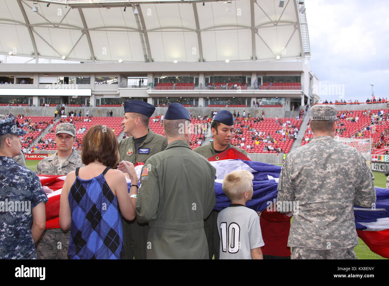 US military with families at sports stadium Stock Photo - Alamy