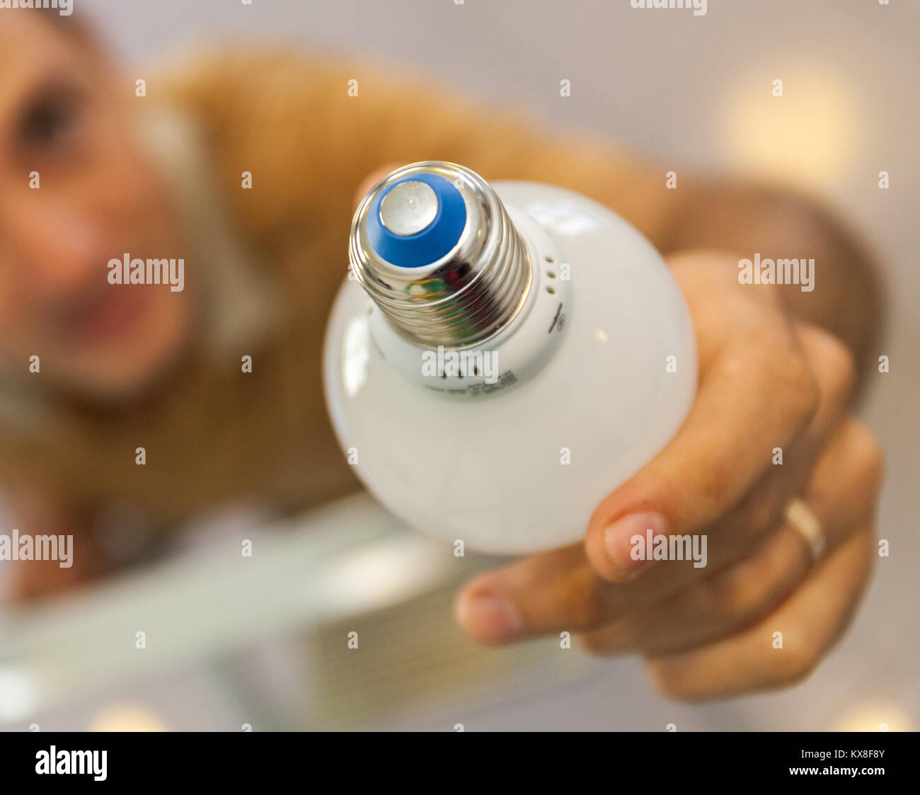 Man ladder light bulb hi-res stock photography and images - Alamy