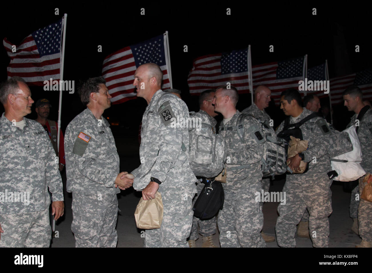 Soldiers with the 141st Military Intelligence Battalion gather at the ...