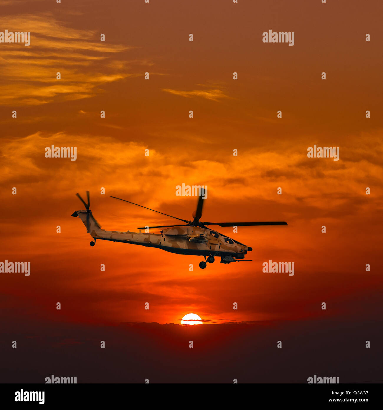 Helicopters at warm sunset Stock Photo - Alamy