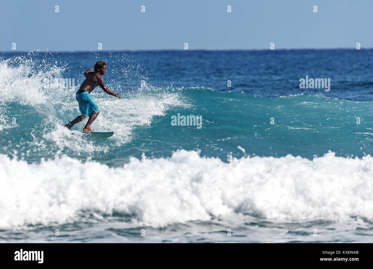 Professional surfer, surfing a wave. Water sport activity. Atlantic ...