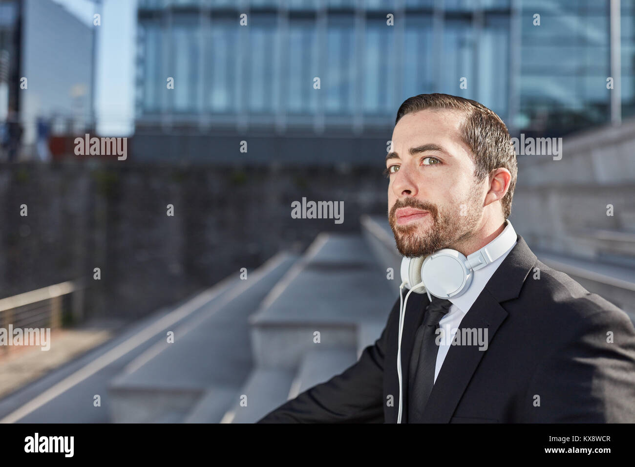 Young business man relaxes in a break and has a daydream Stock Photo ...
