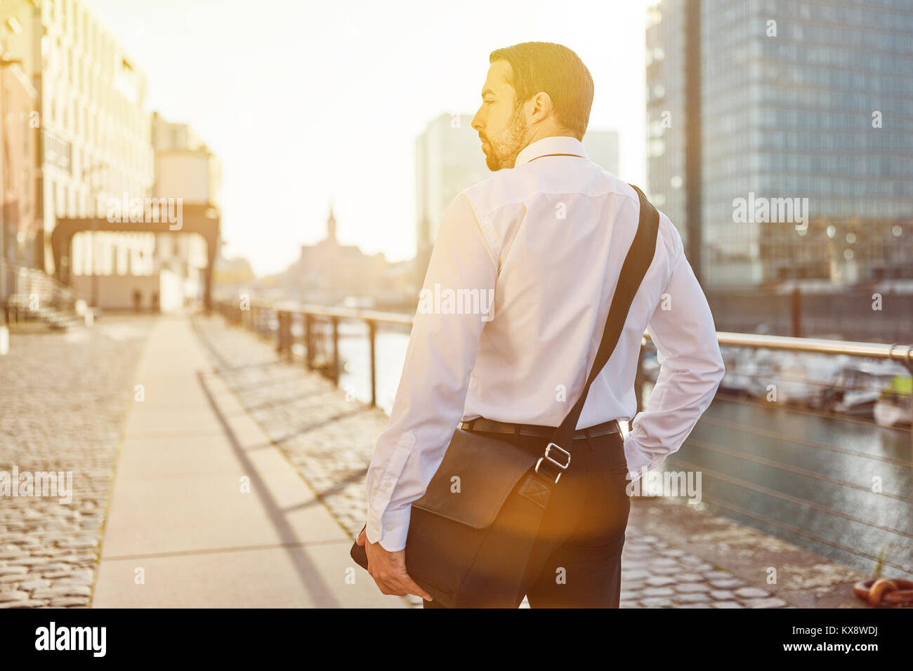 Business man as commuter on the way home in summer Stock Photo - Alamy
