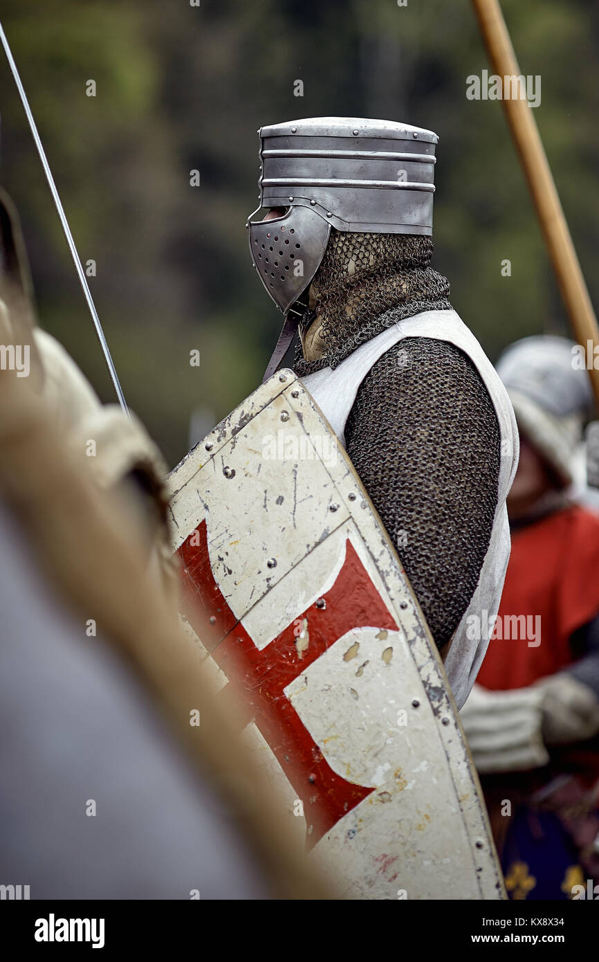 Knight in armor. Medieval battle (historical reconstruction Stock Photo ...