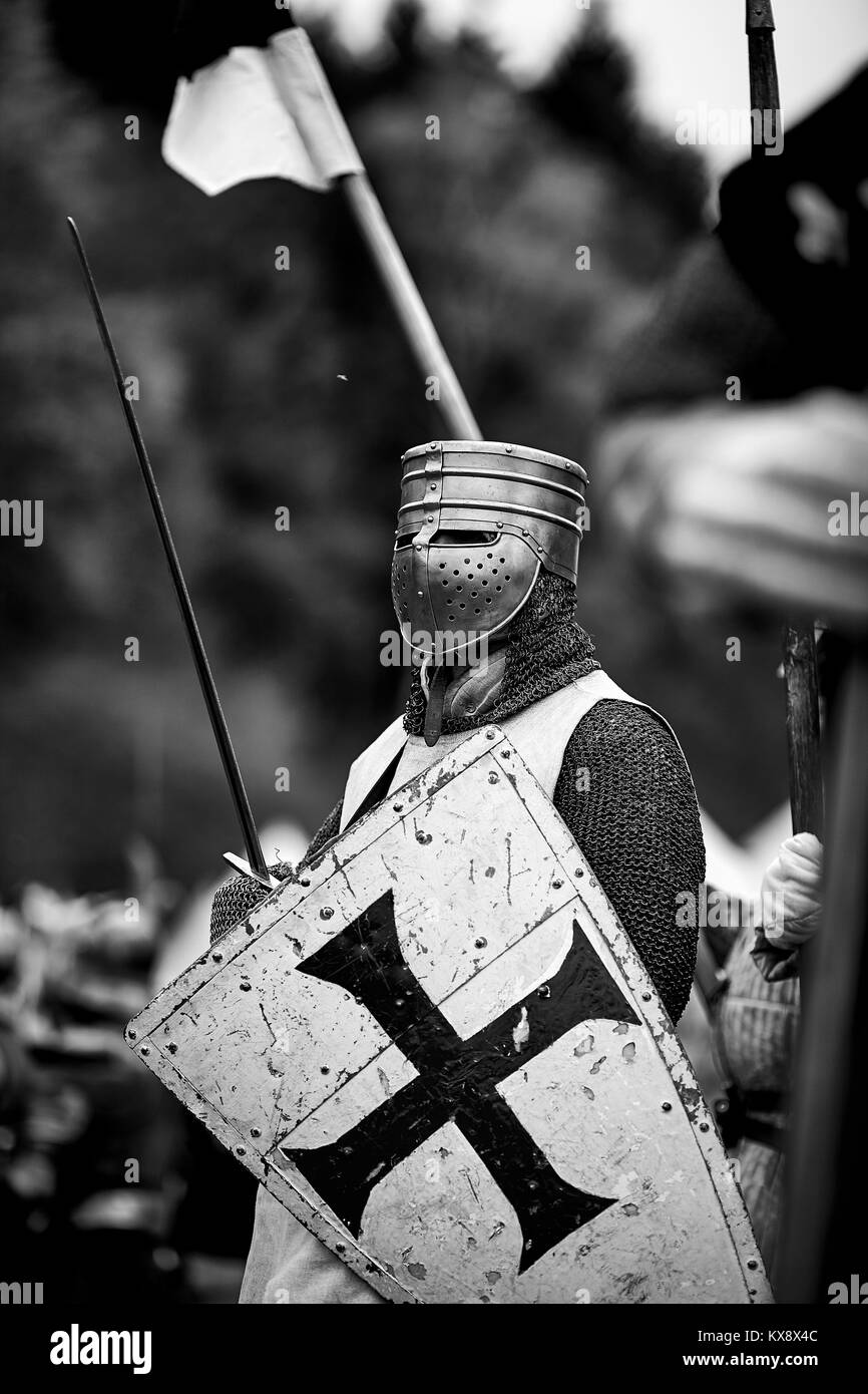 Knight in armor. Medieval battle (historical reconstruction Stock Photo ...