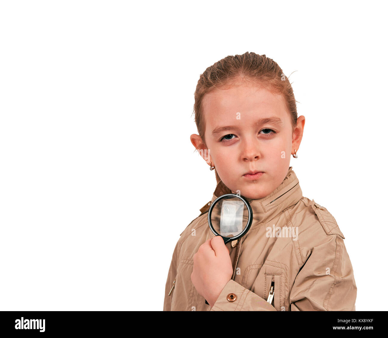 girl detective with magnifying glass in a raincoat on a white ...