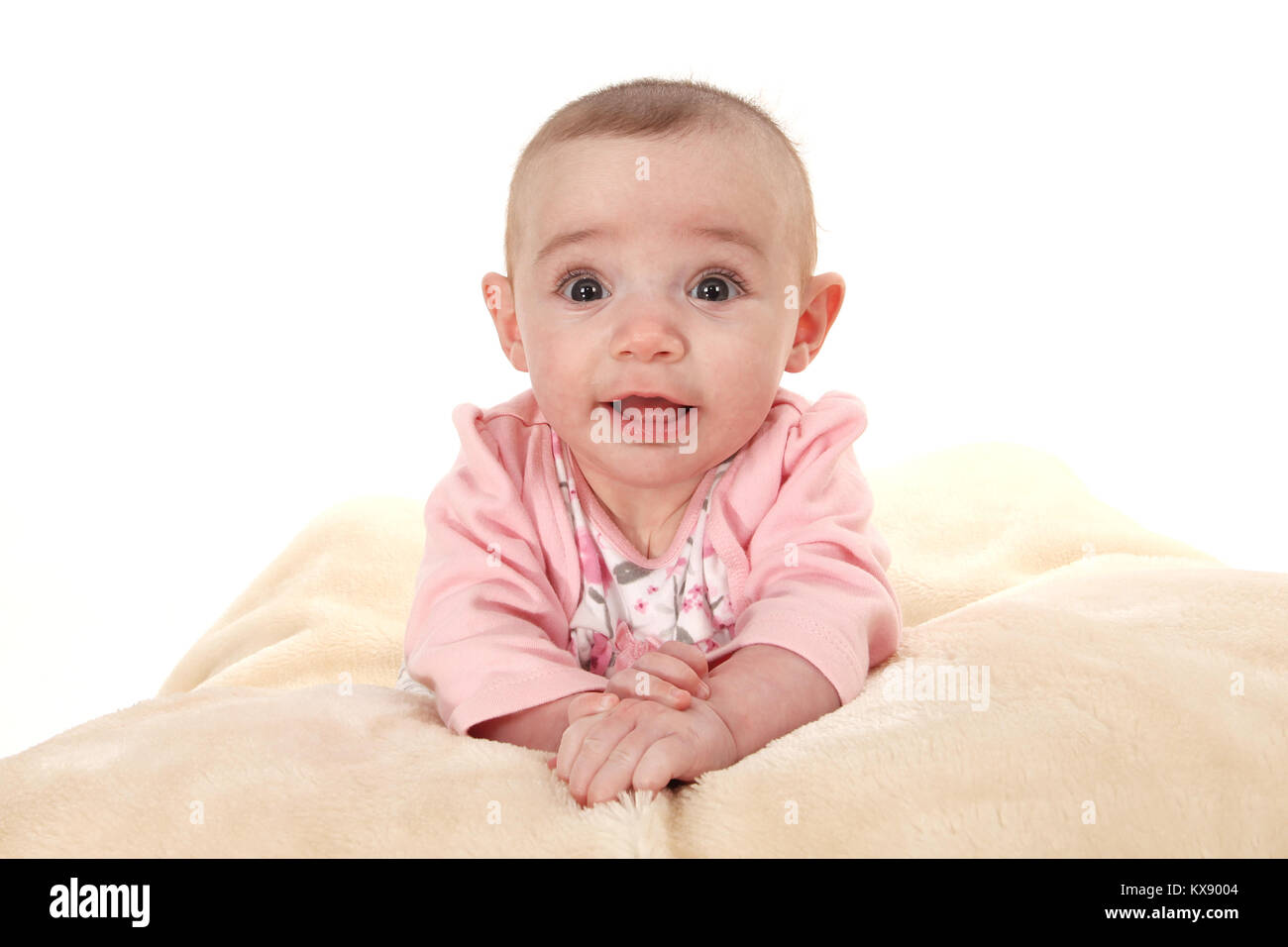 baby girl playing on rug, child development and play Stock Photo - Alamy