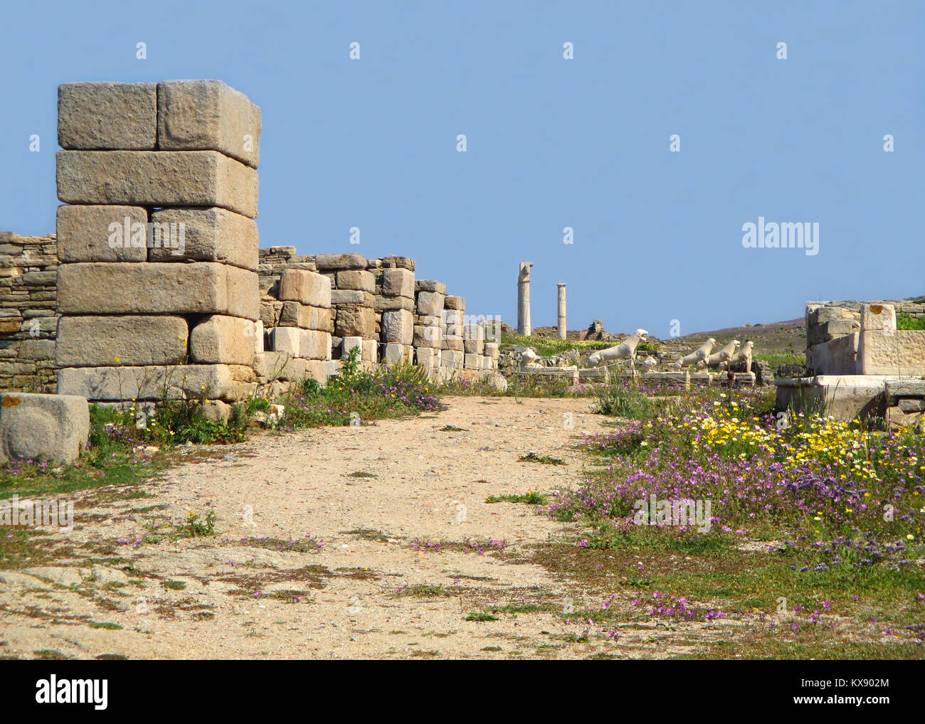Walkway amongst the ancient remains in the Archaeological Site of Delos ...