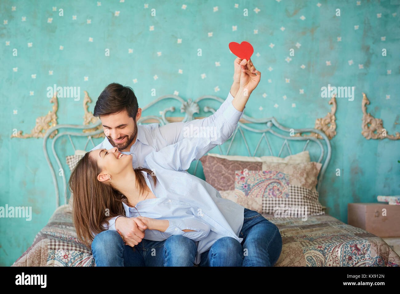 Couple hug bed hi-res stock photography and images - Alamy
