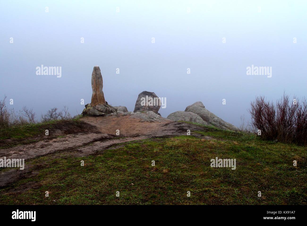 Stones in the mist Stock Photo - Alamy