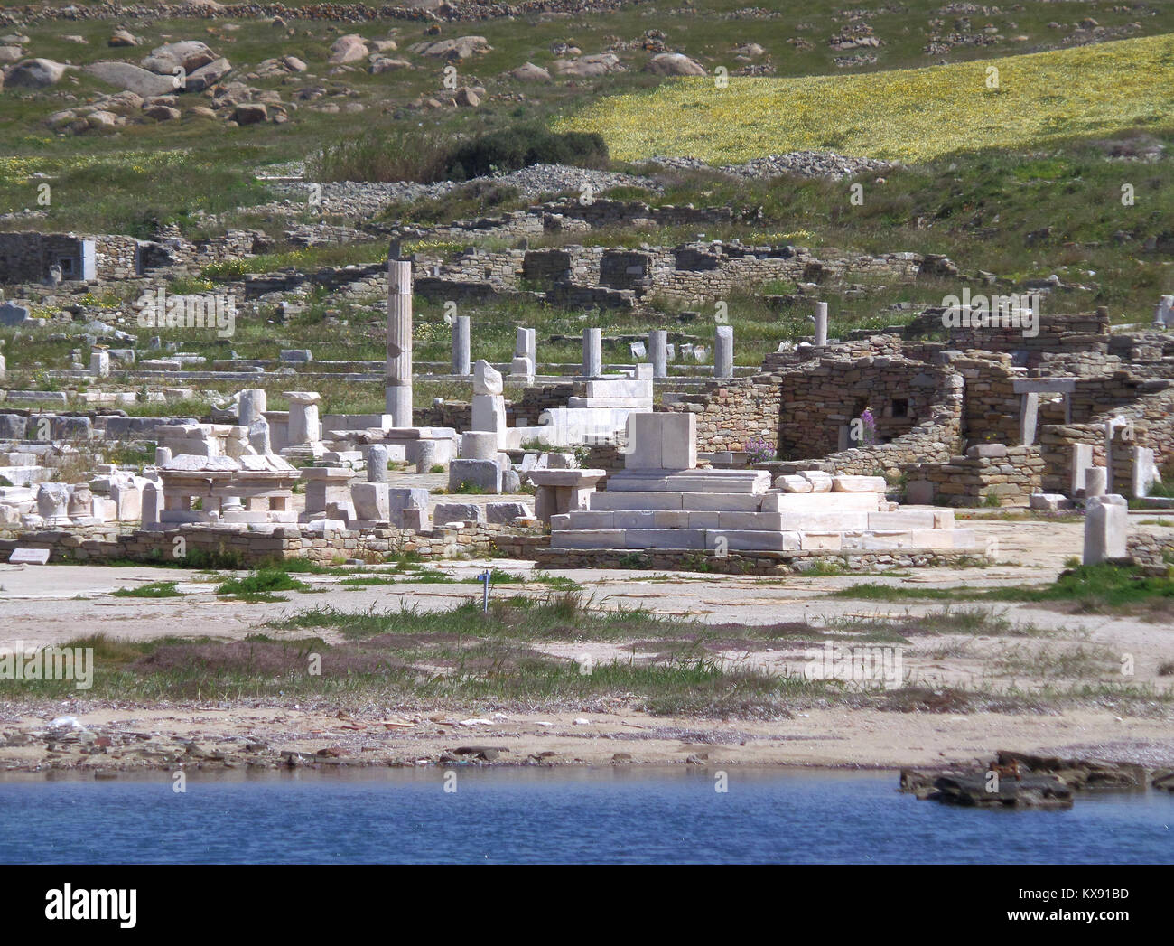 The Remains at Archaeological Site of Delos as seen from the ferry ...