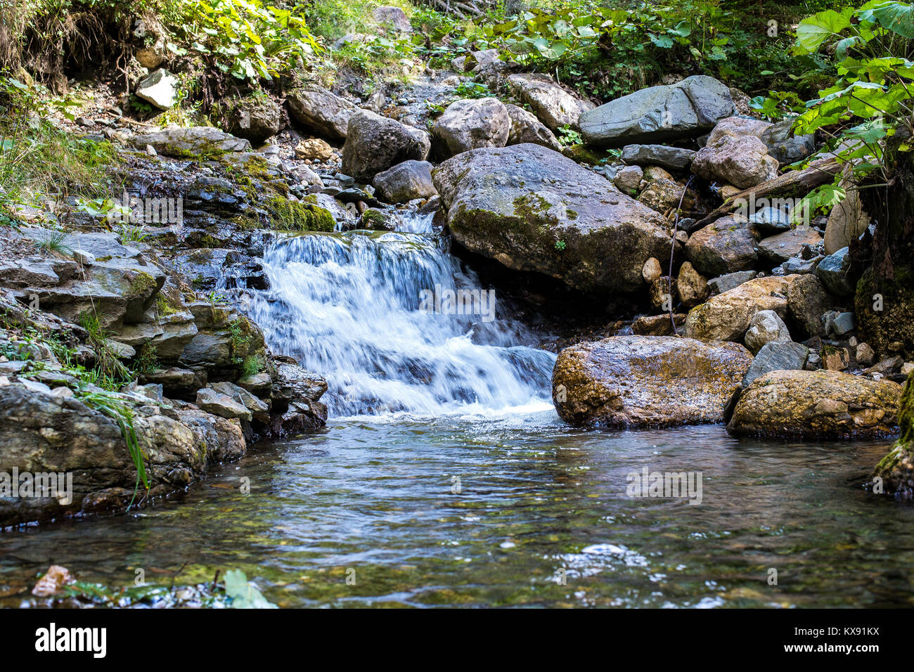 Waterfall mountain landscape Stock Photo - Alamy
