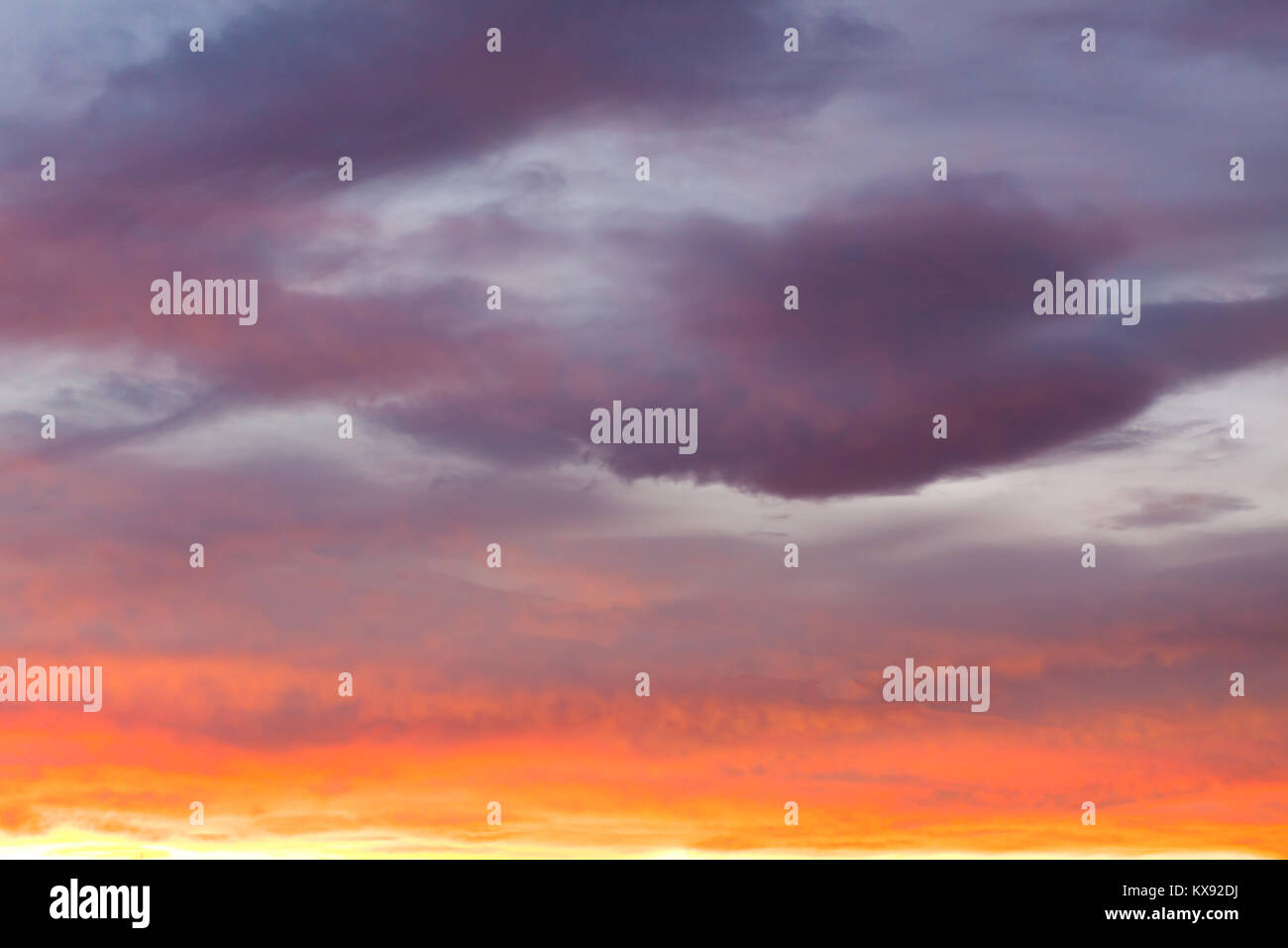 Dramatic sunrise sky with colorful heavy clouds Stock Photo - Alamy