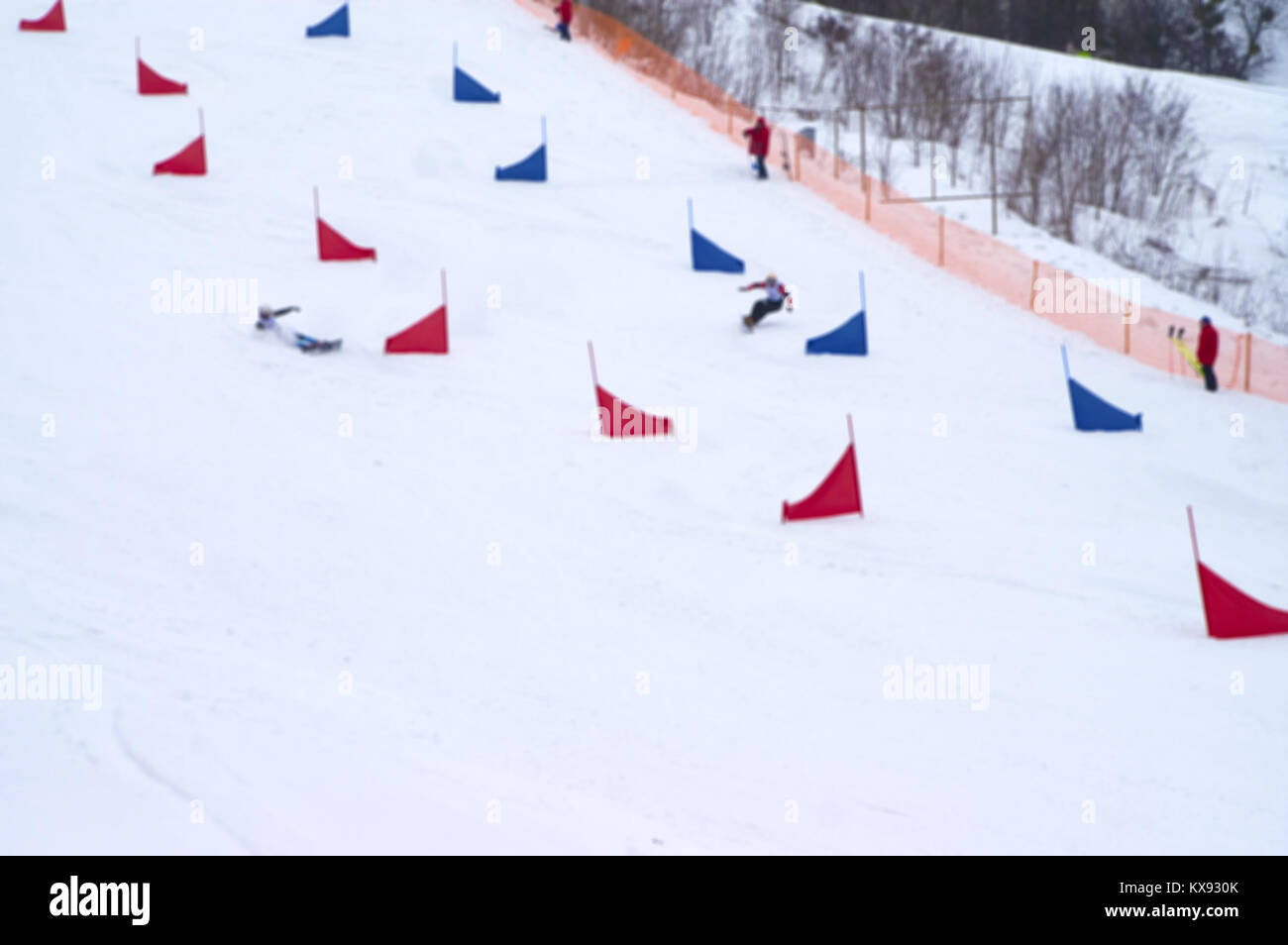 Snowboarding giant parallel slalom competition. Blurred background ...