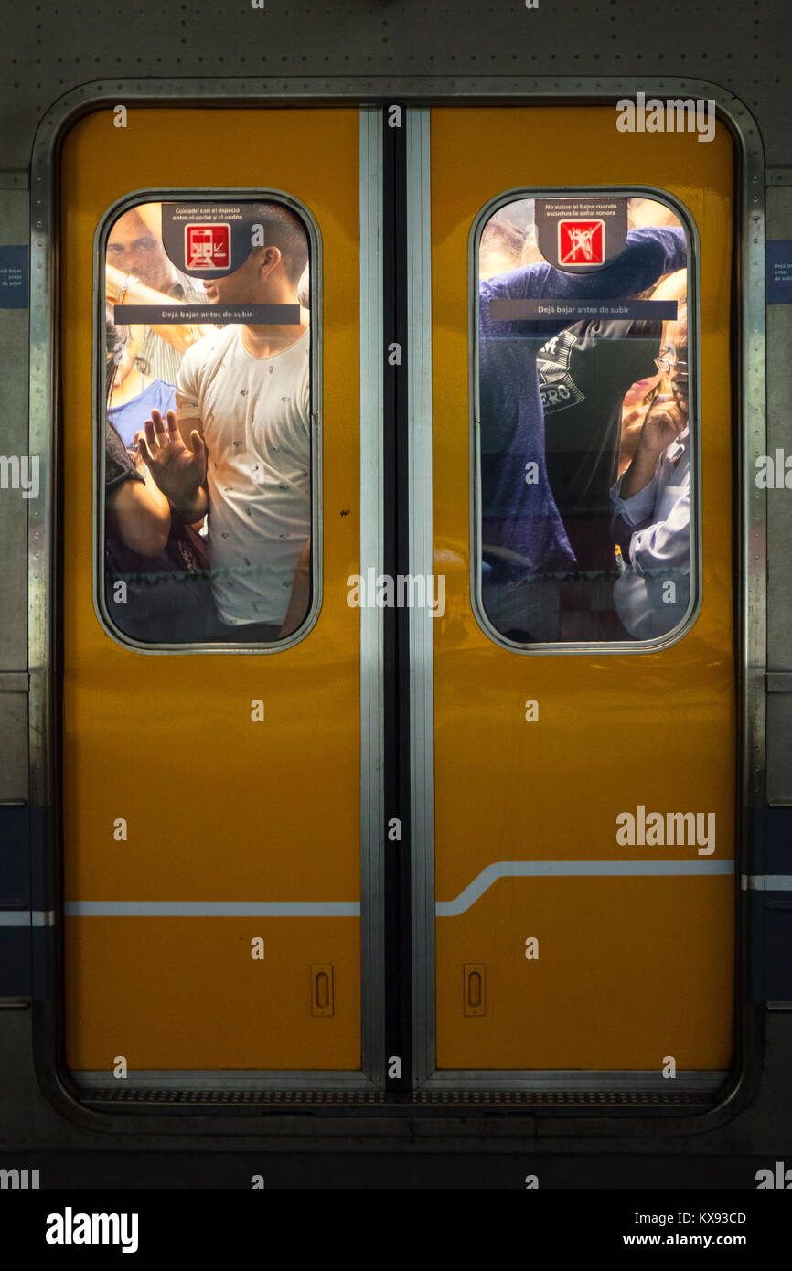 A crowded subway train during the rush hour. Buenos Aires, Argentina ...
