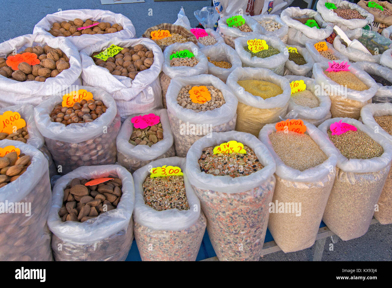 Beans and Nuts for sale on a market stall Stock Photo - Alamy