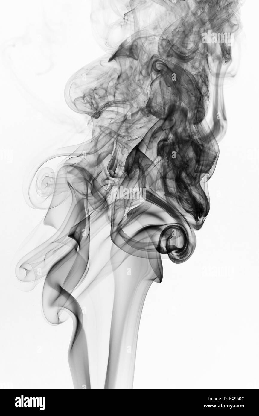 A whisp of black smoke against the white background Stock Photo - Alamy