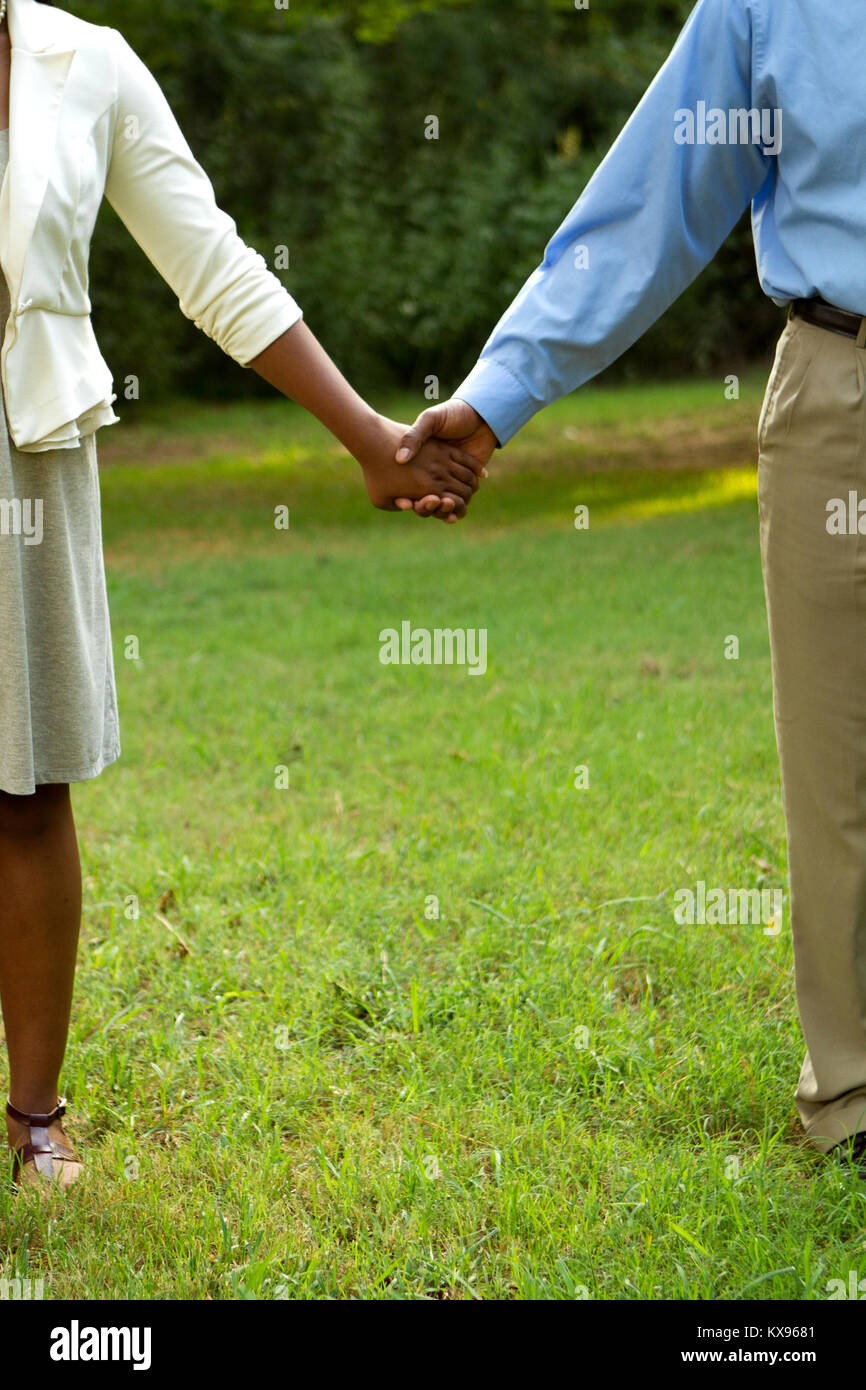 Beautiful happy couple smiling outside Stock Photo - Alamy