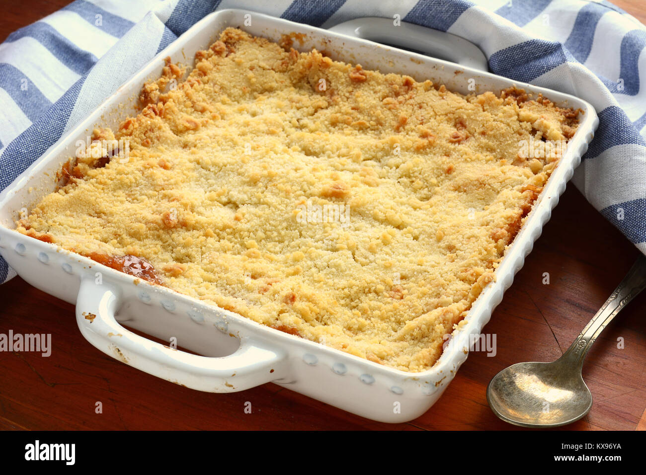 Old fashioned apple crumble in horizontal format and shot in natural ...