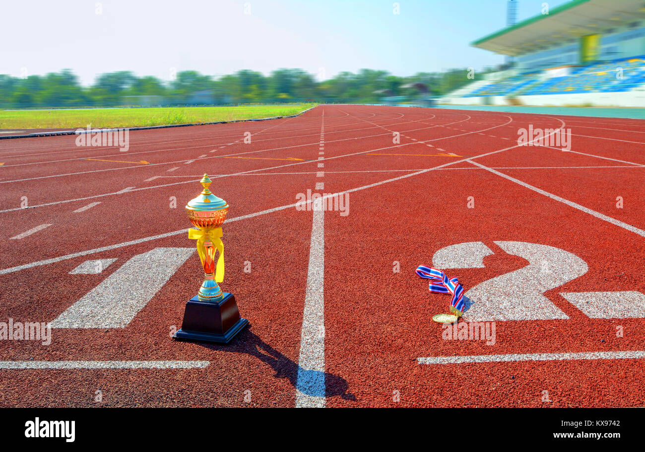 gold cup winner, track running Stock Photo - Alamy