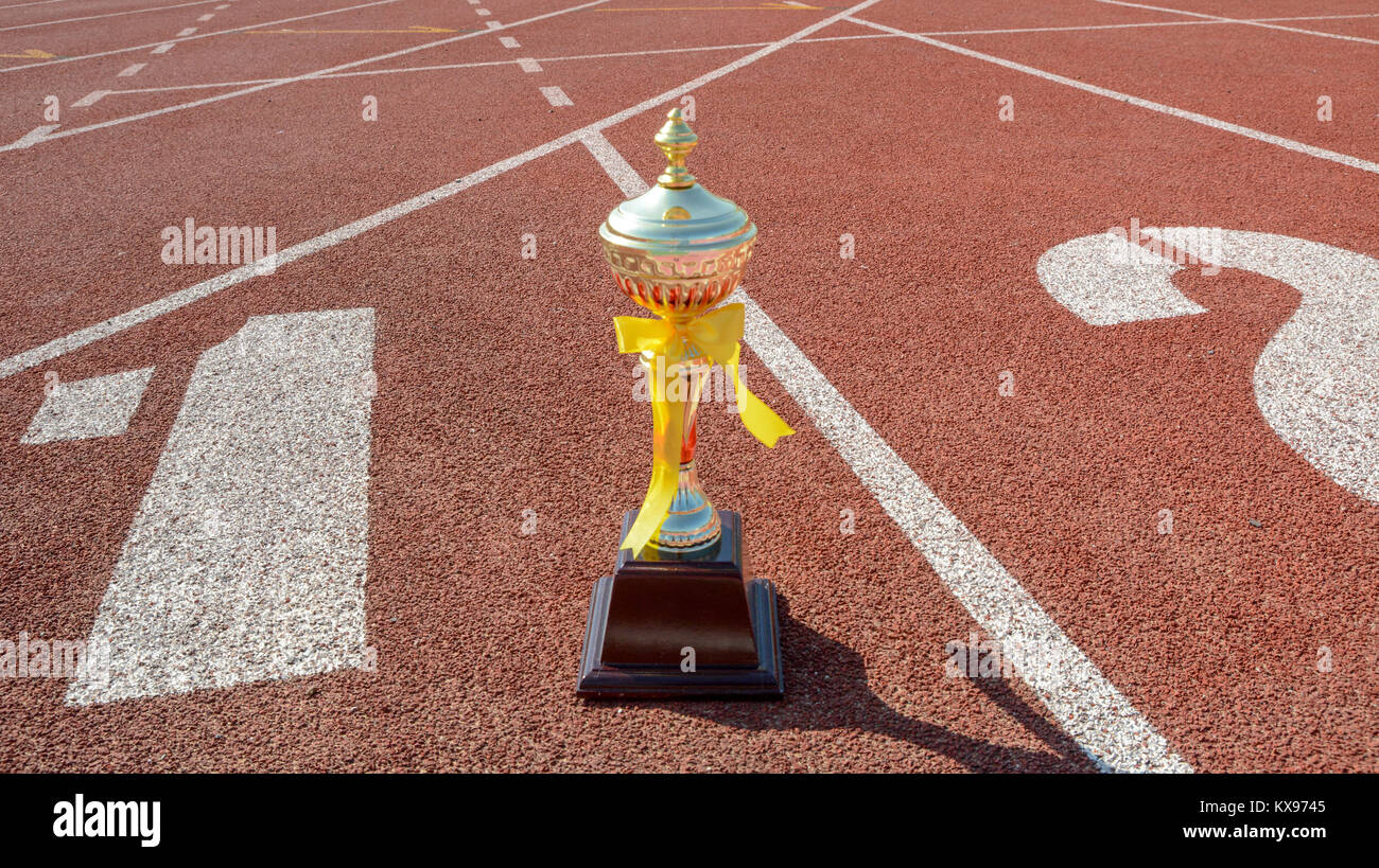 gold cup winner, track running Stock Photo - Alamy