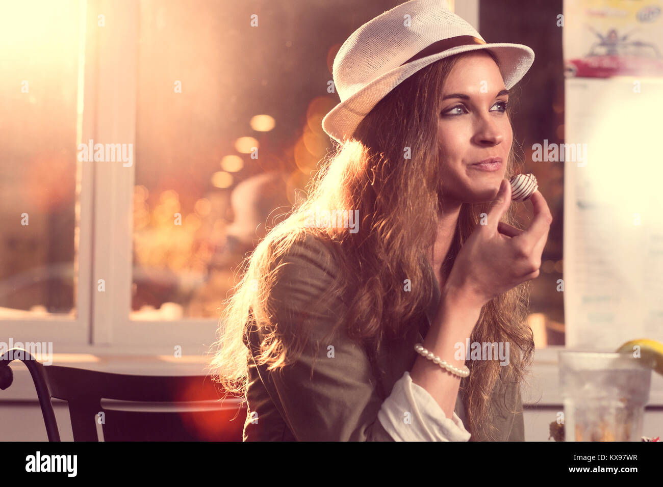 Woman eating hat hi-res stock photography and images - Alamy