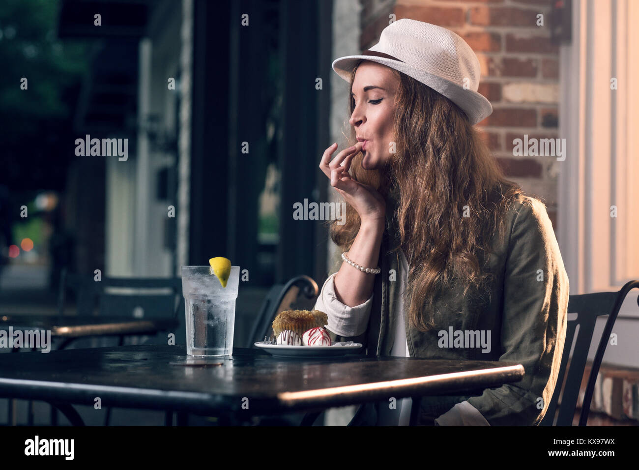 Woman eating hat hi-res stock photography and images - Alamy