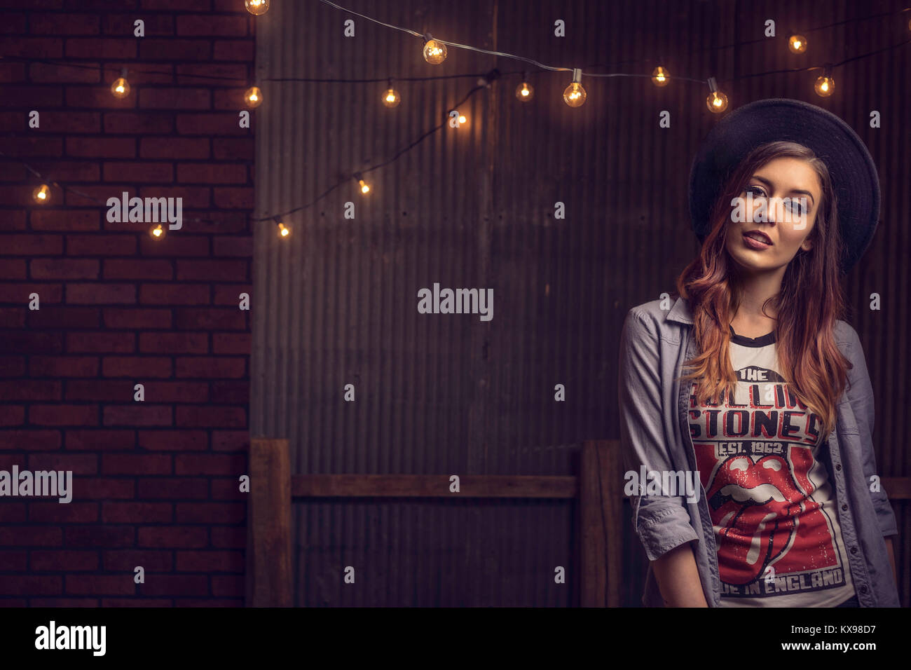 Young trendy woman in urban setting Stock Photo - Alamy