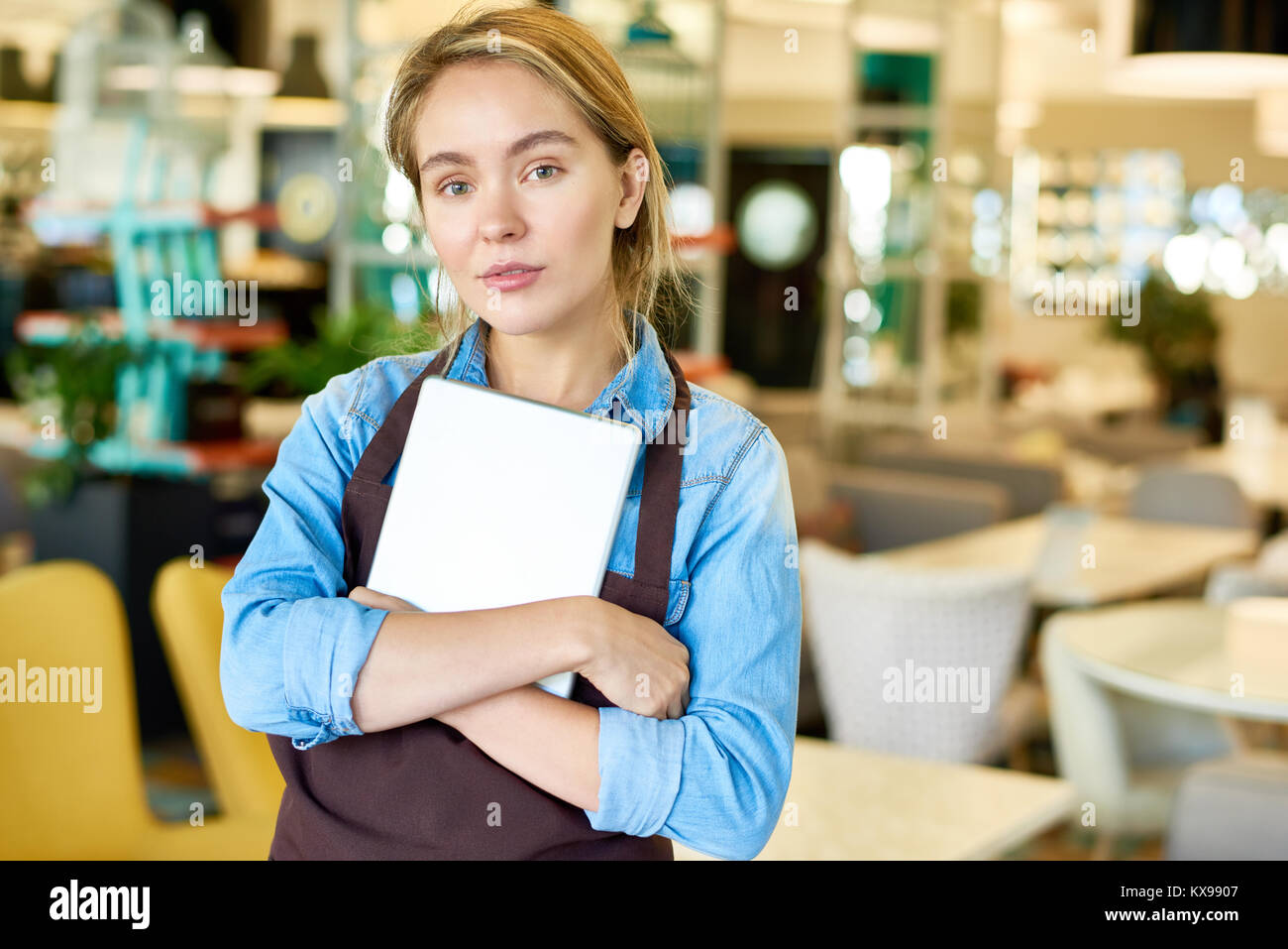Pretty Waitress Posing for Photography Stock Photo - Alamy