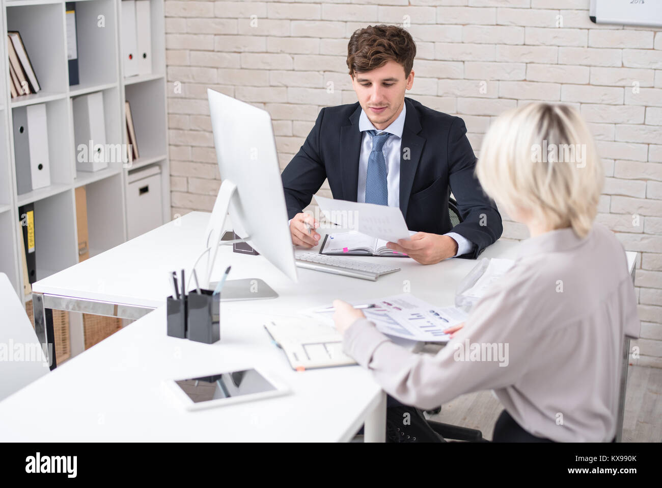 Business People Discussing Statistics during Meeting in Office Stock ...