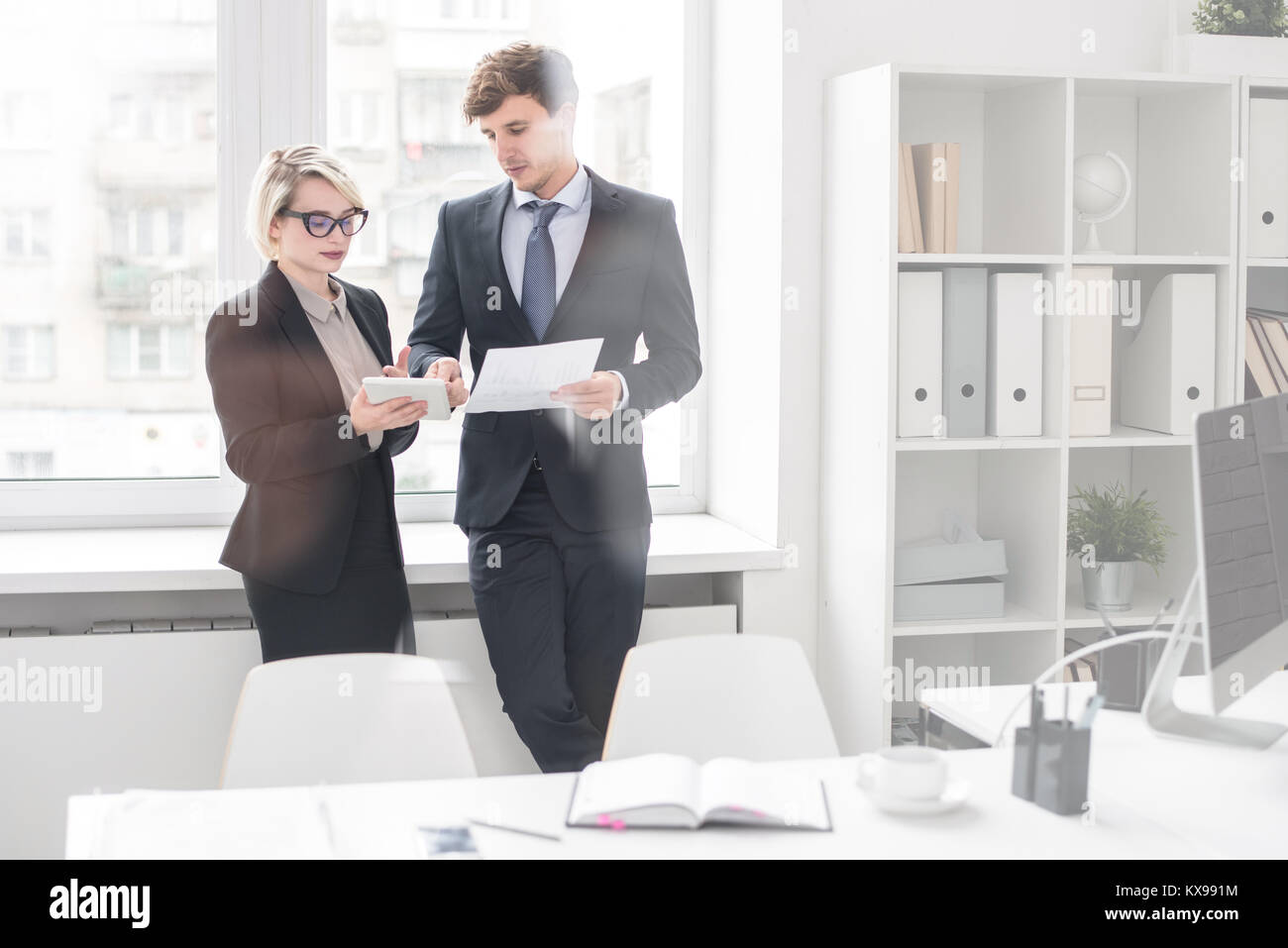 Business Man and Woman Working Together Stock Photo - Alamy