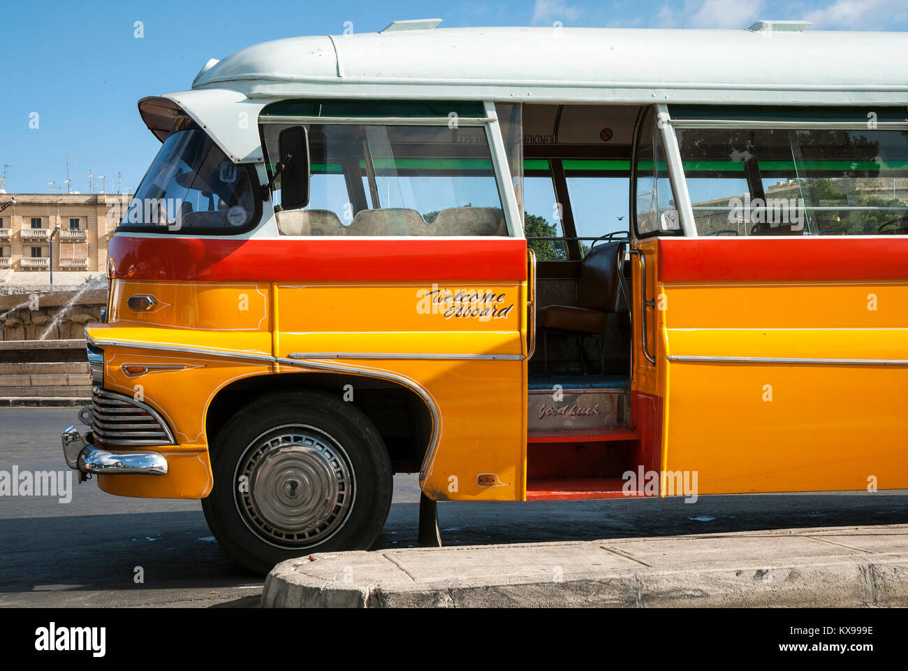 vintage orange british bedford buses on street of la valletta old town ...