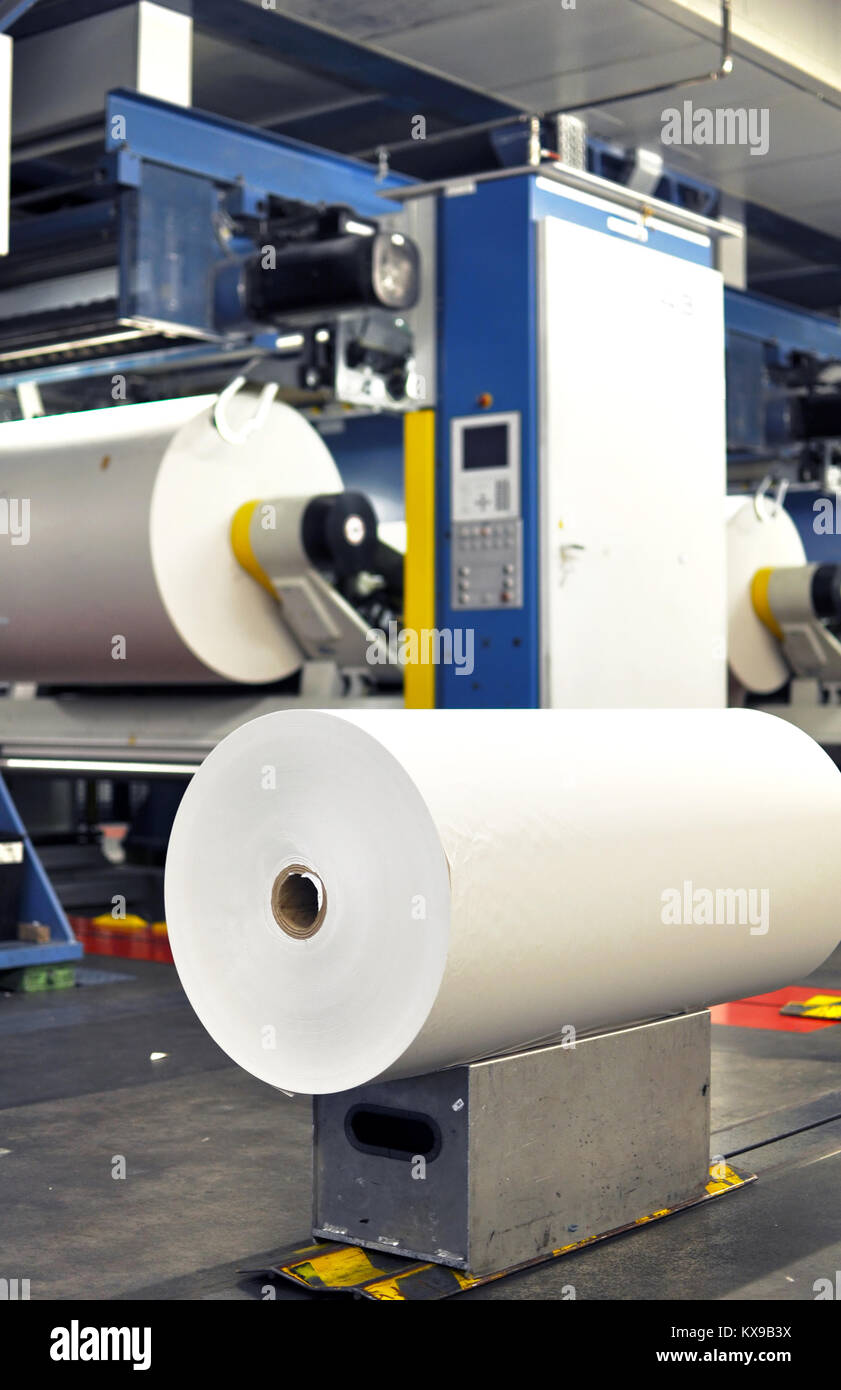 Paper rolls in a printing machine of a large print shop Stock Photo - Alamy