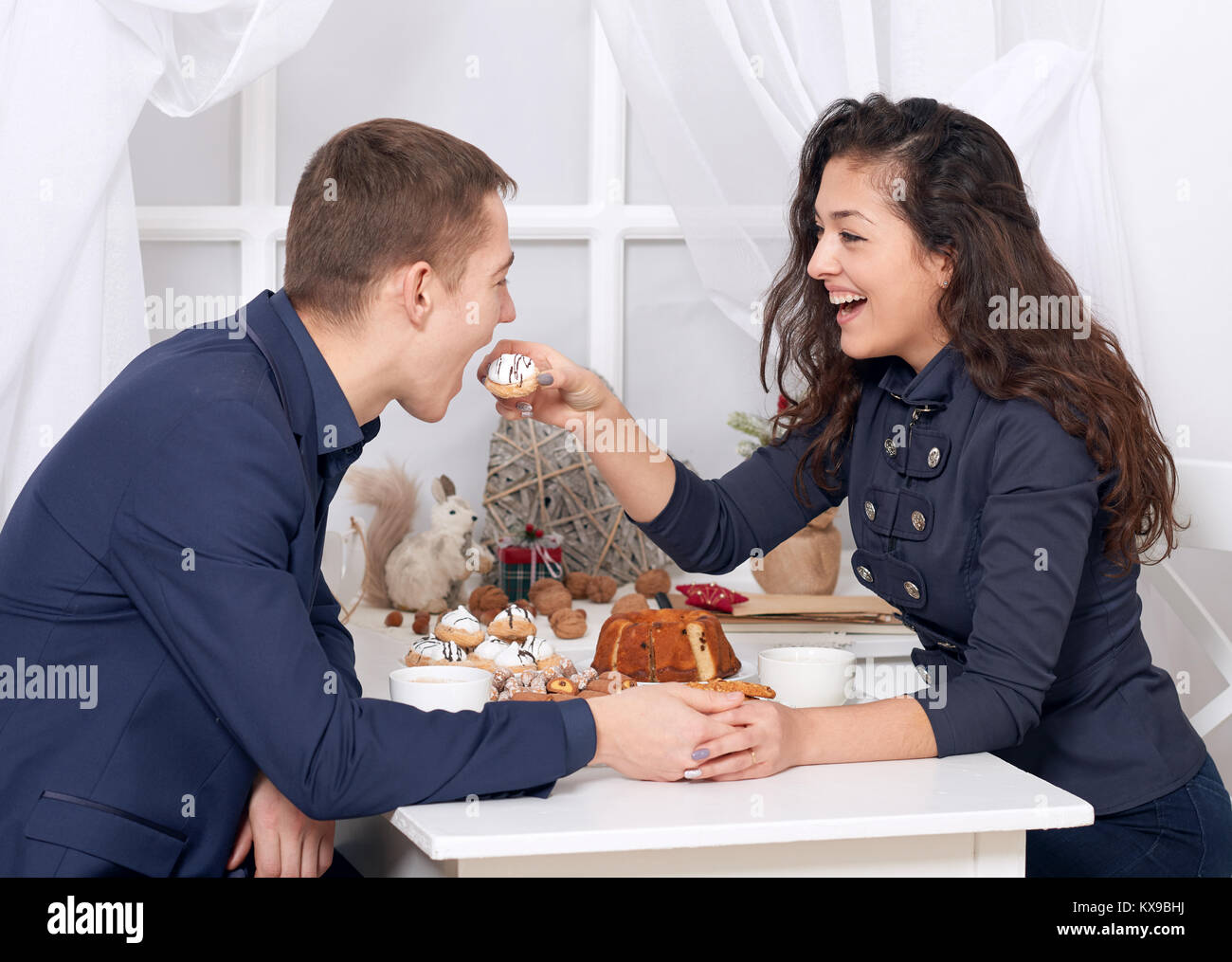 happy couple drinking tea indoor Stock Photo - Alamy