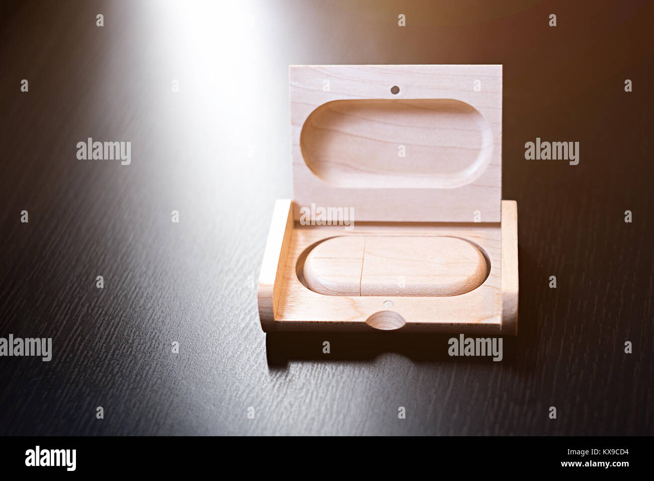 wooden usb flash drive on a black table Stock Photo - Alamy