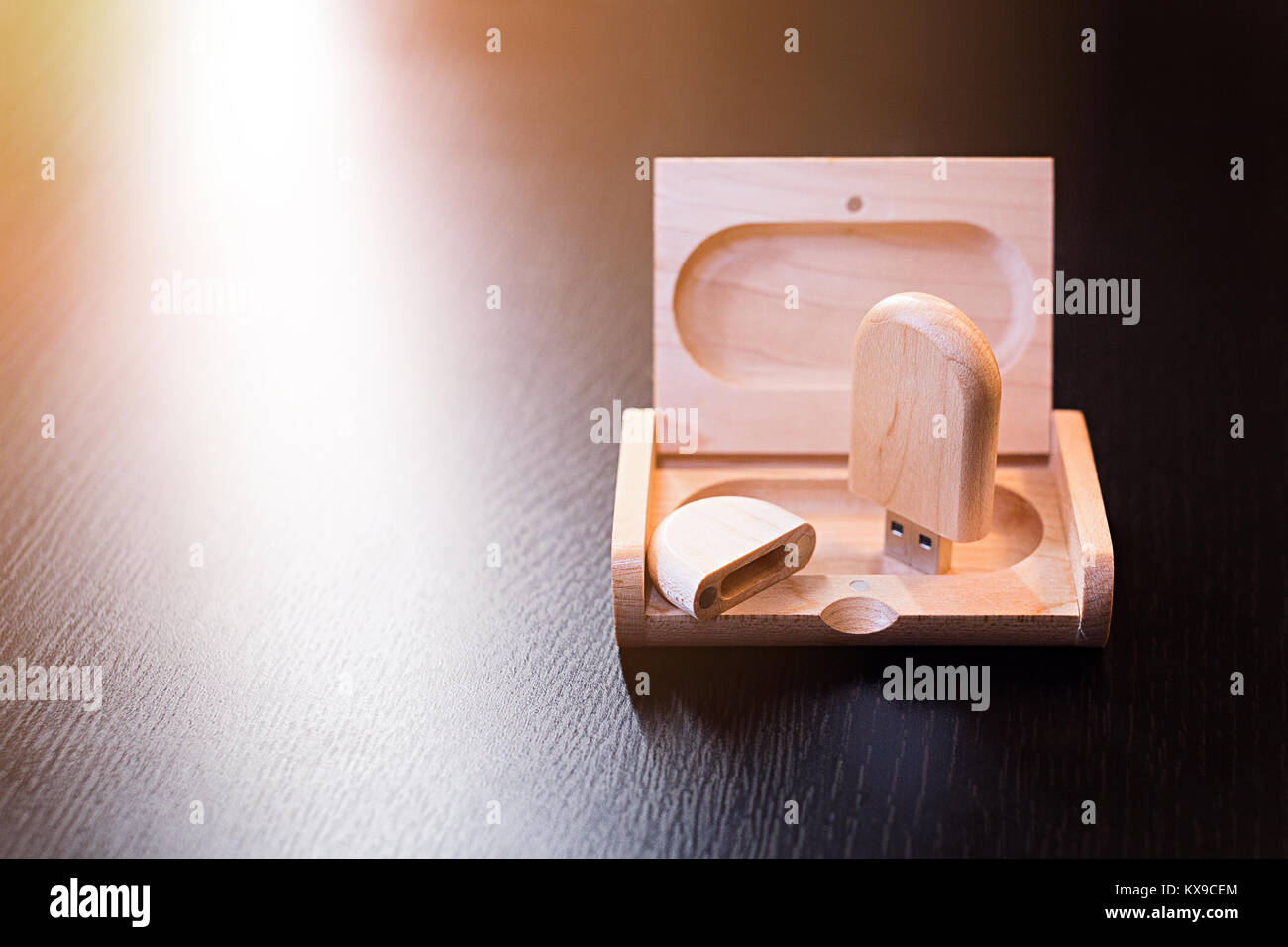 wooden usb flash drive on a black table Stock Photo - Alamy