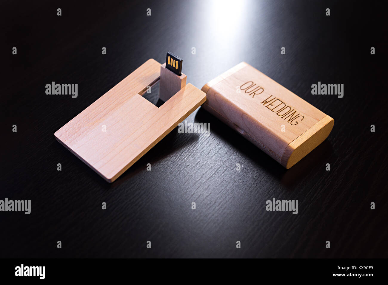 wooden usb flash drive on a black table Stock Photo - Alamy