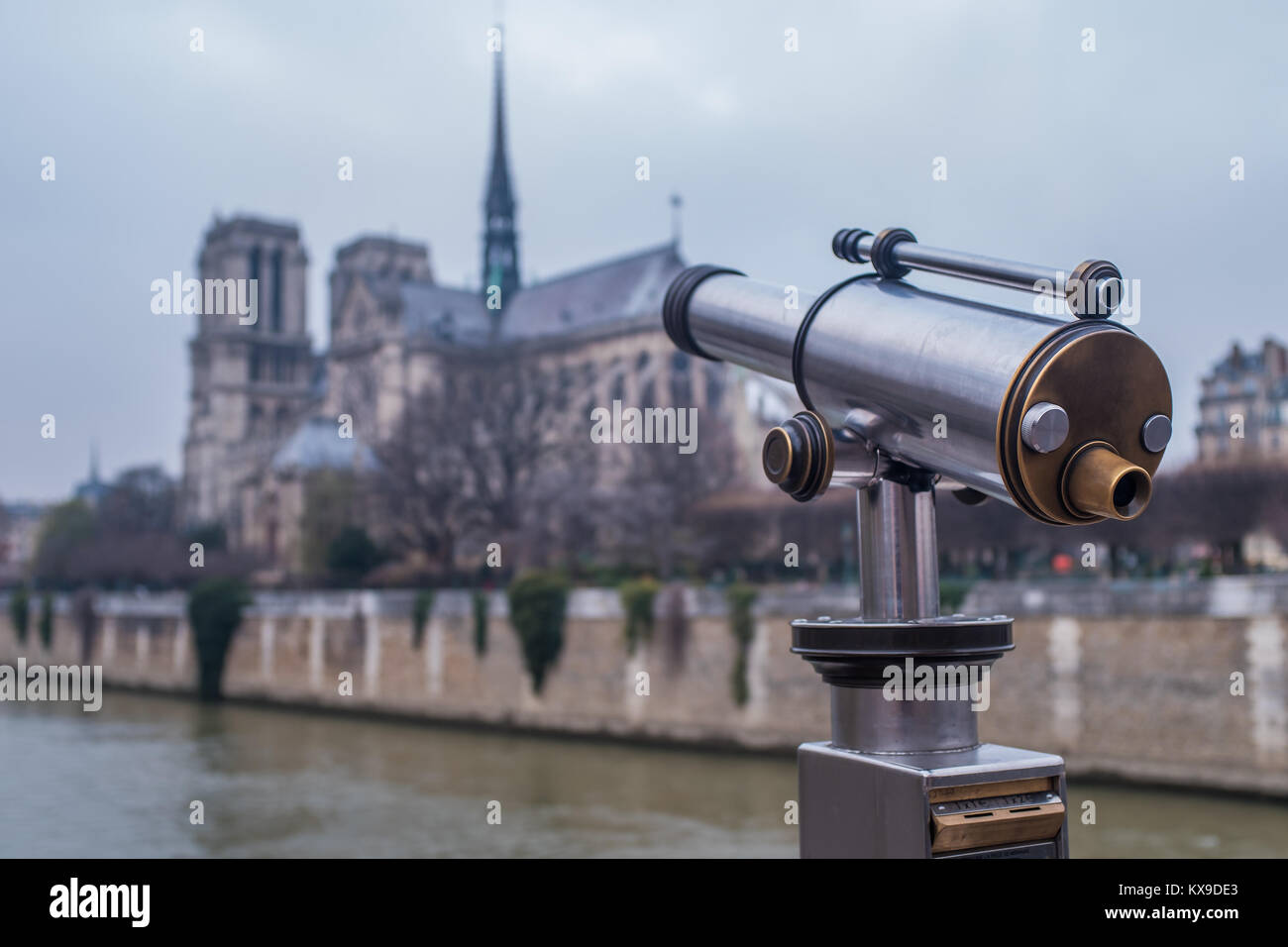 telescope at Notre Dame de Paris at night Stock Photo - Alamy
