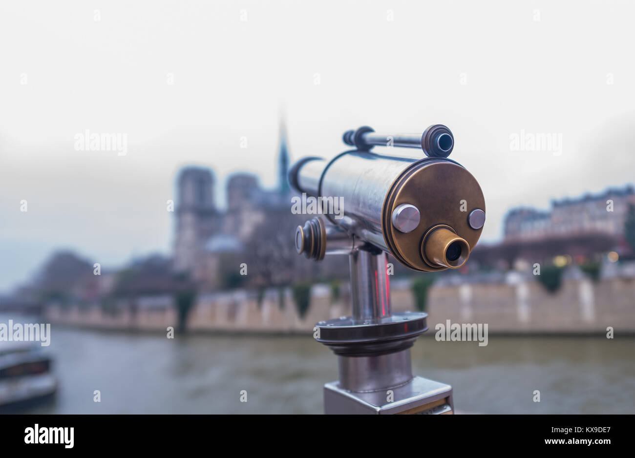 telescope at Notre Dame de Paris at night Stock Photo - Alamy