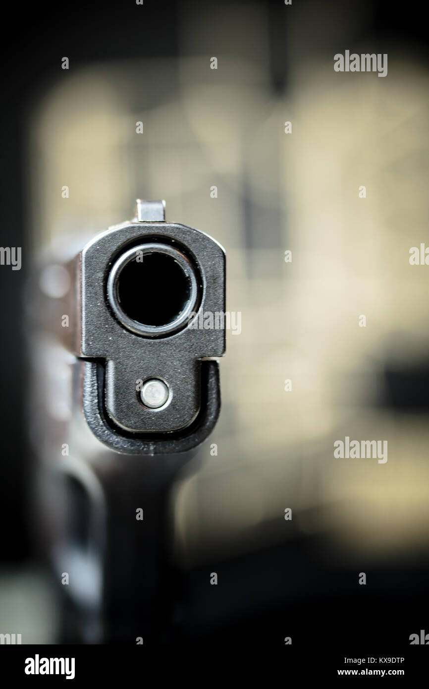 A black pistol hand gun Stock Photo - Alamy