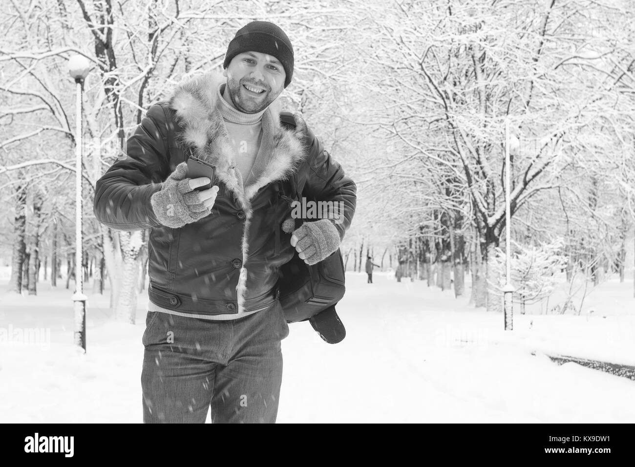 A man in winter clothes on the street Stock Photo - Alamy