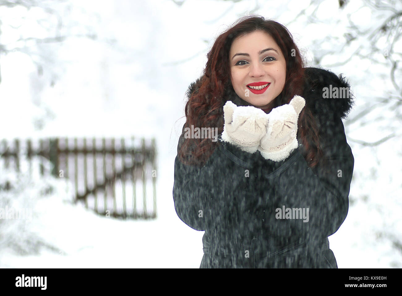 Beautiful girl in winter snowy day Stock Photo - Alamy