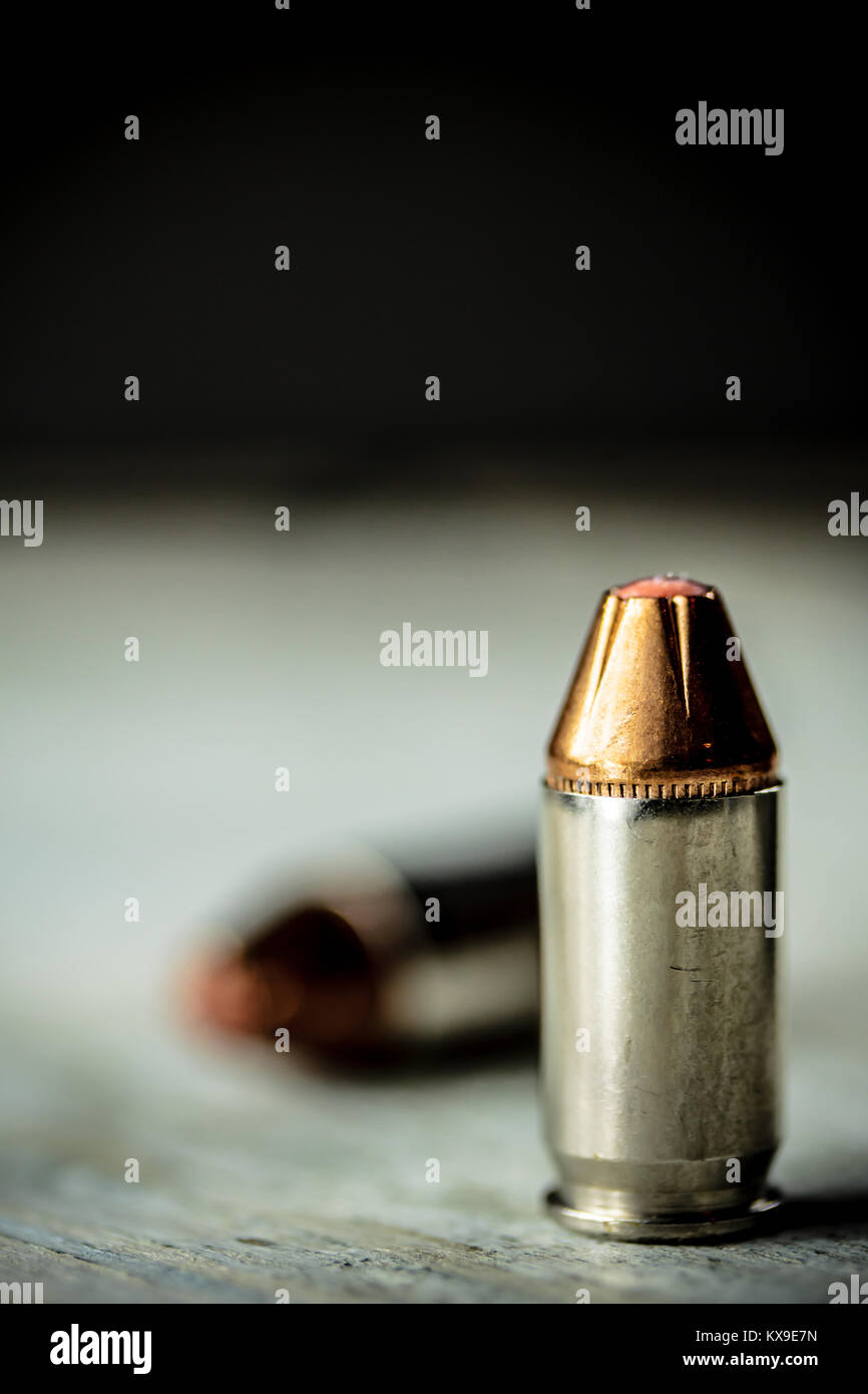 A hand gun pistol bullets Stock Photo - Alamy
