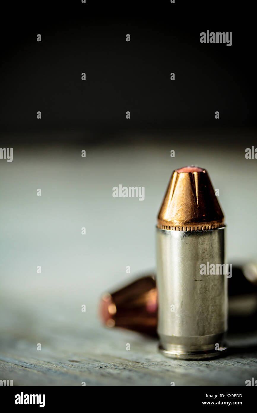 A hand gun pistol bullets Stock Photo - Alamy